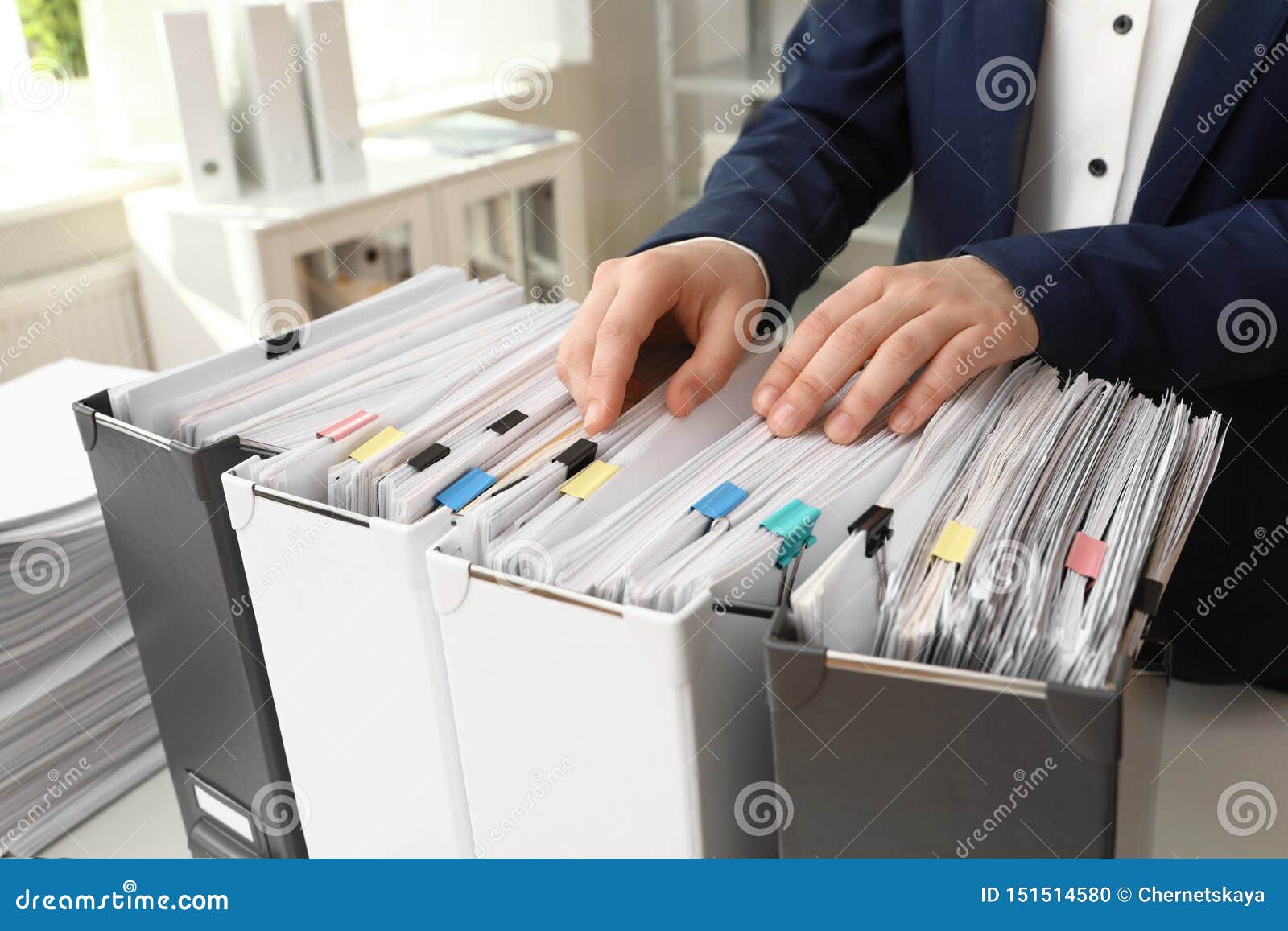 Woman Taking Documents from Folder in Archive Stock Photo - Image of ...