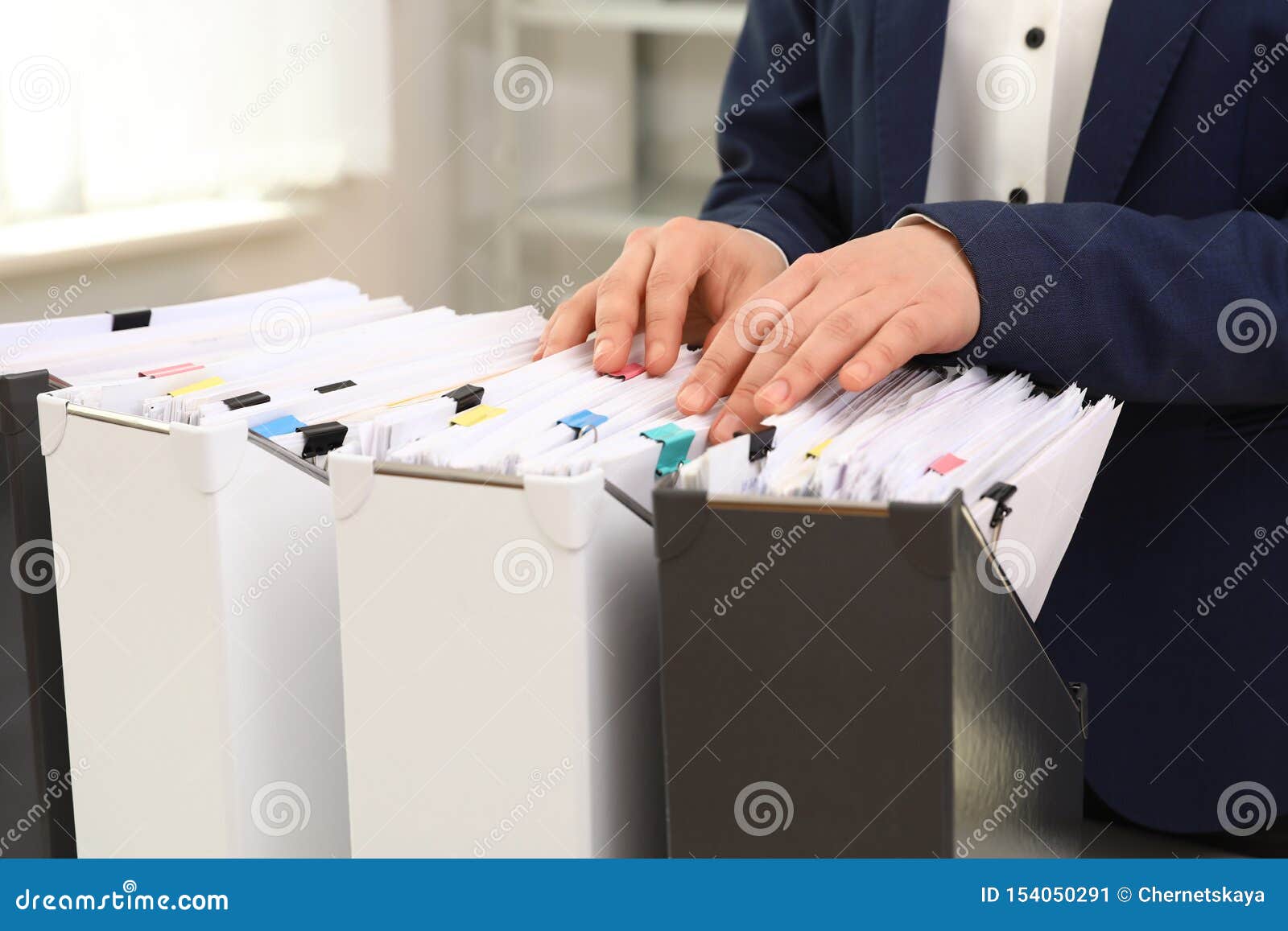 Woman Taking Documents from Folder in Archive Stock Image - Image of ...