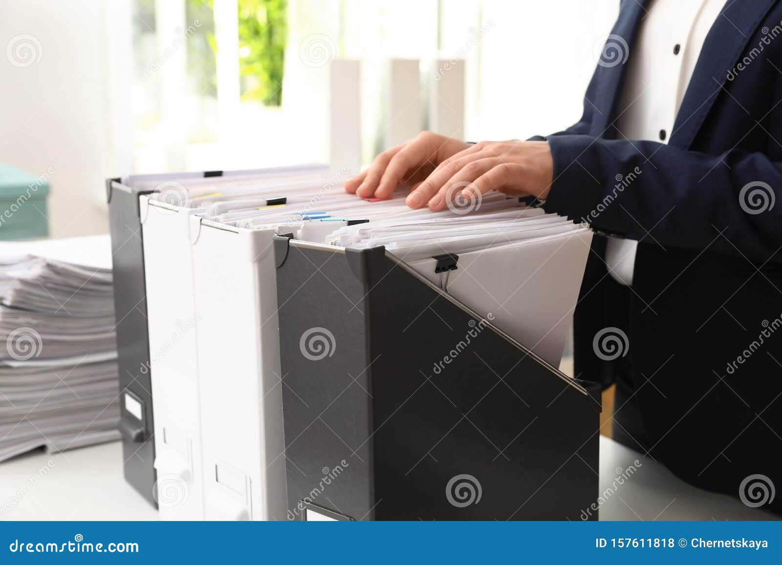 Woman Taking Documents from Folder in Archive Stock Photo - Image of ...