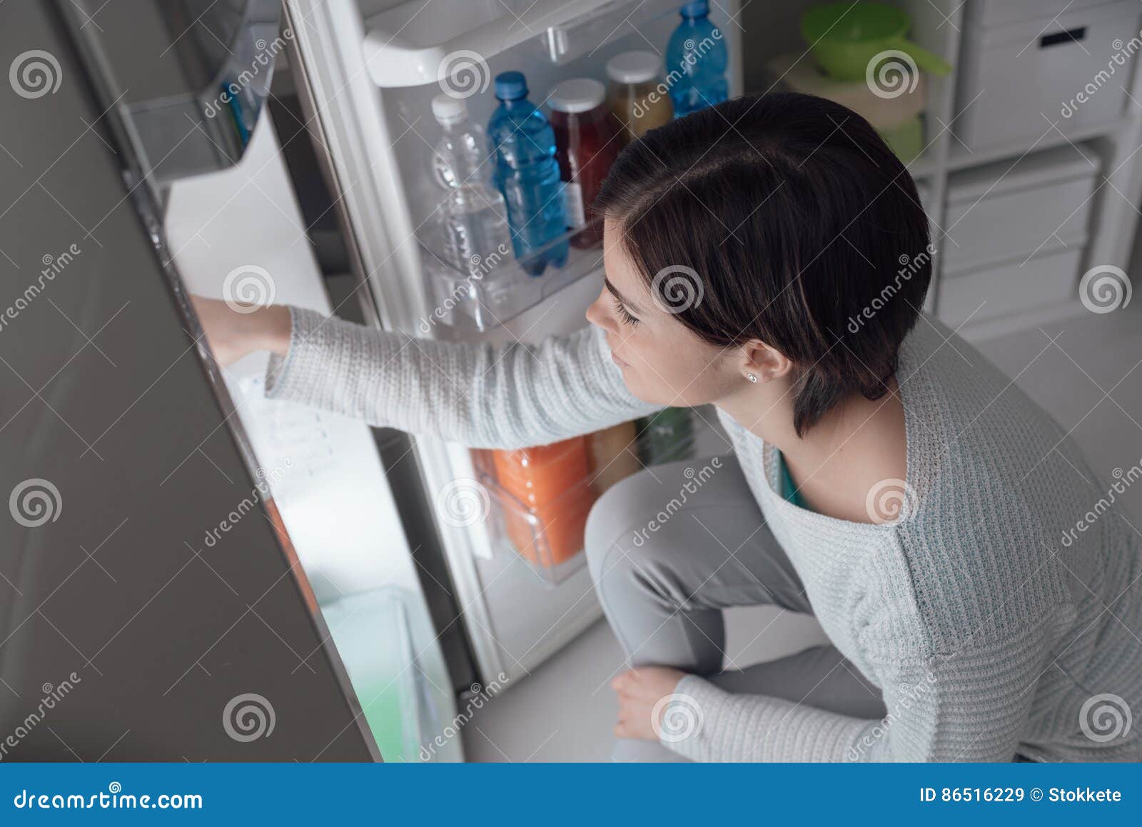 Woman Taking Food Out of the Fridge Stock Image - Image of beautiful ...