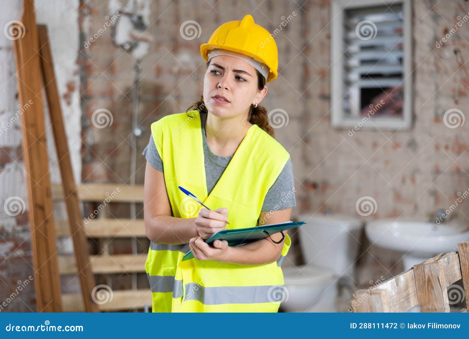 Woman Taking Notes on Indoor Construction Site Stock Photo - Image of ...