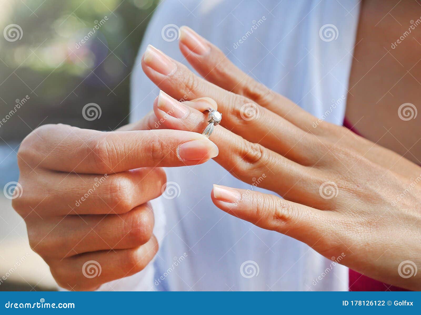 Woman is Taking Off the Wedding Ring Stock Photo - Image of disagree ...