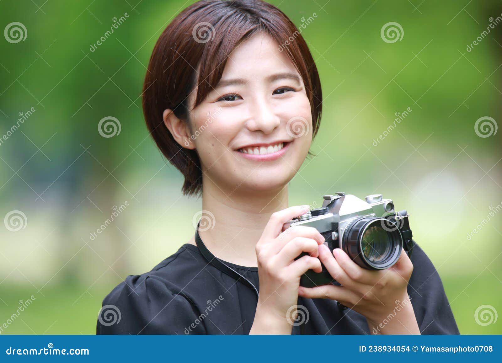 Woman taking a picture stock photo. Image of beautiful - 238934054