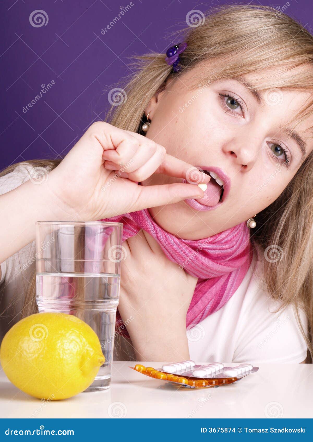 Woman is taking a pill stock photo. Image of bright, scarf - 3675874