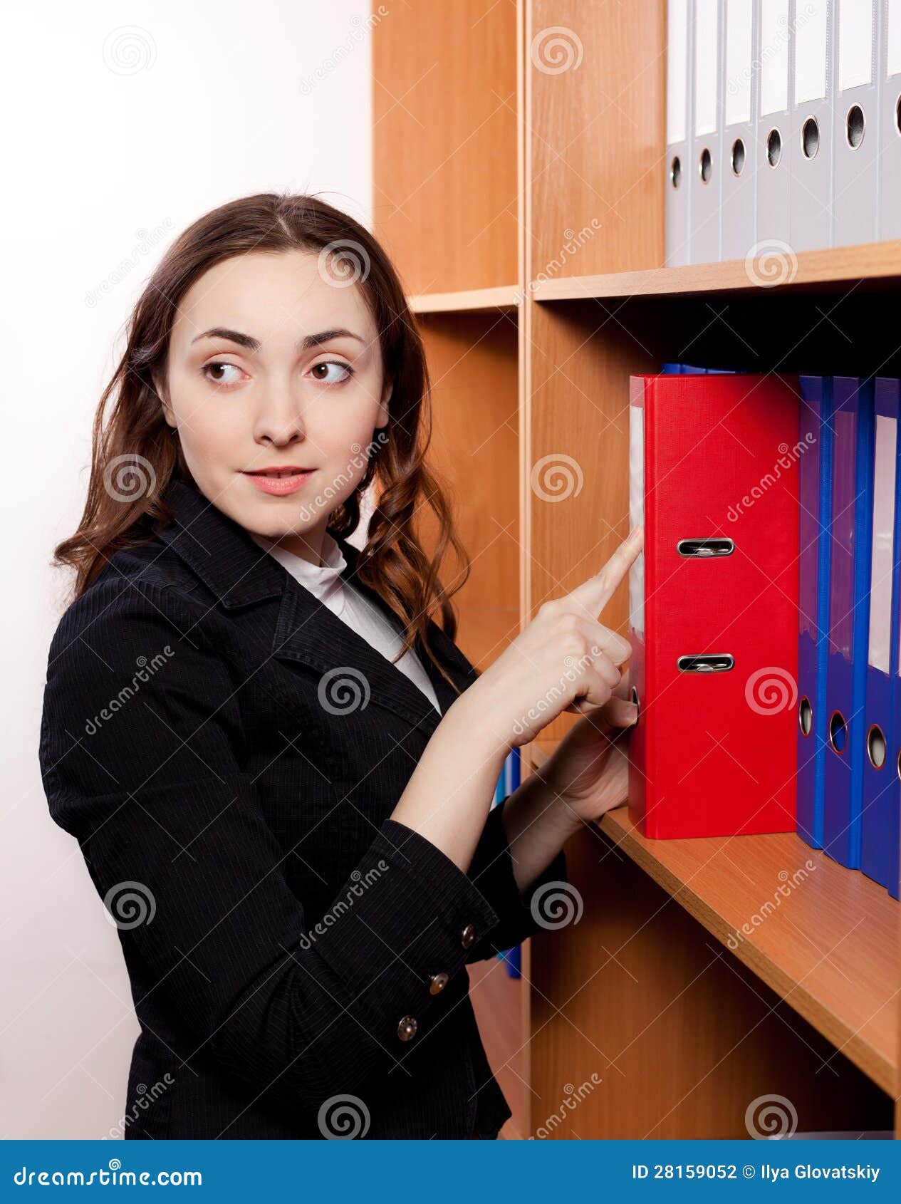 Woman Taking a Red Folder from Shelf Stock Photo - Image of information ...