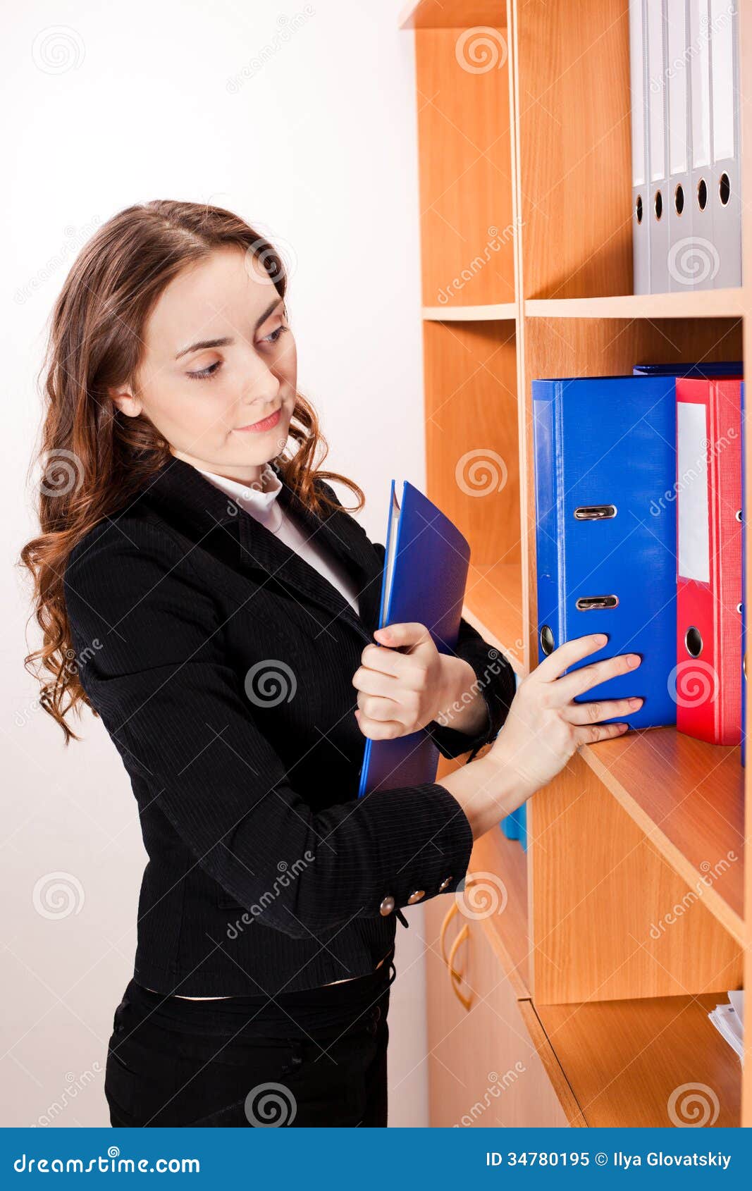 Woman Taking a Red Folder from Shelf Stock Image - Image of office ...