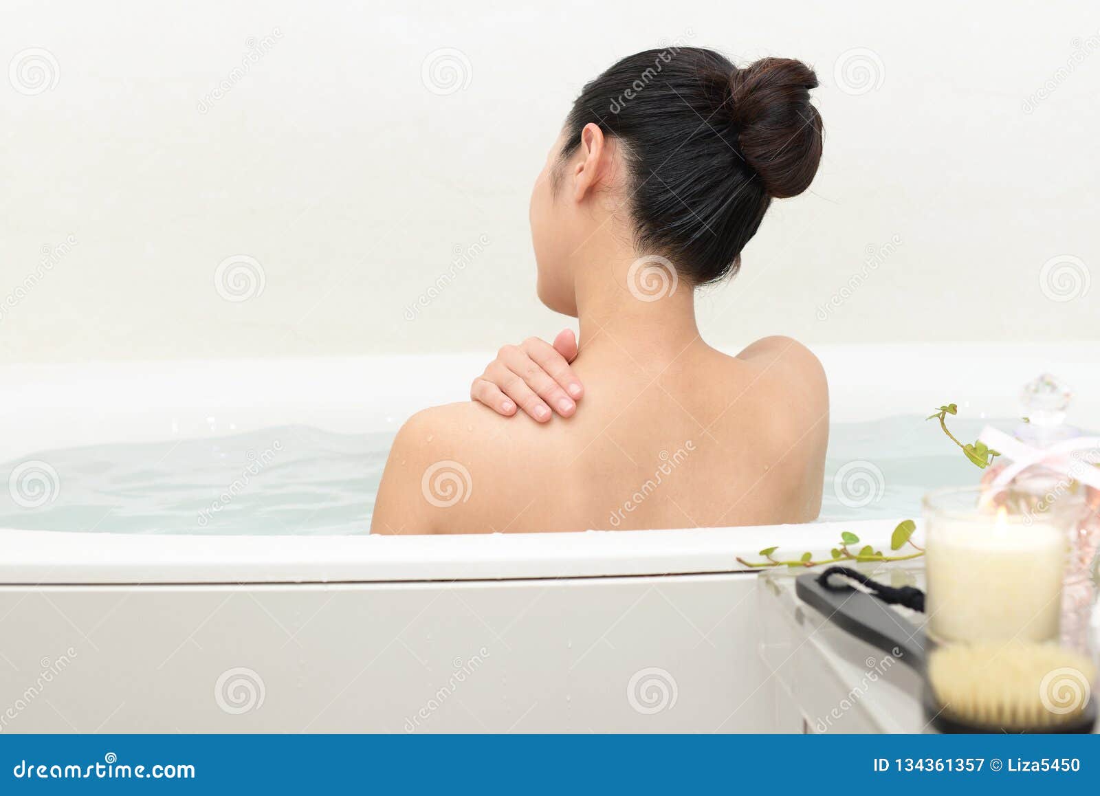 Woman taking relaxing bath stock image. Image of beautiful - 134361357
