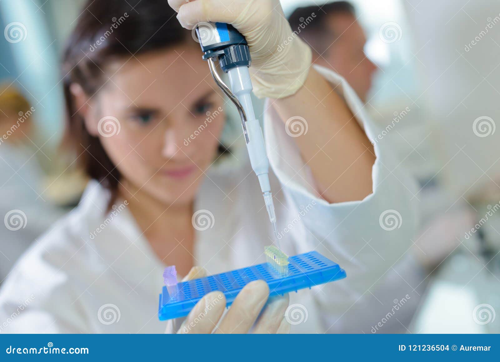 Woman Taking Samples from Pipette Stock Photo - Image of hand, medicine ...