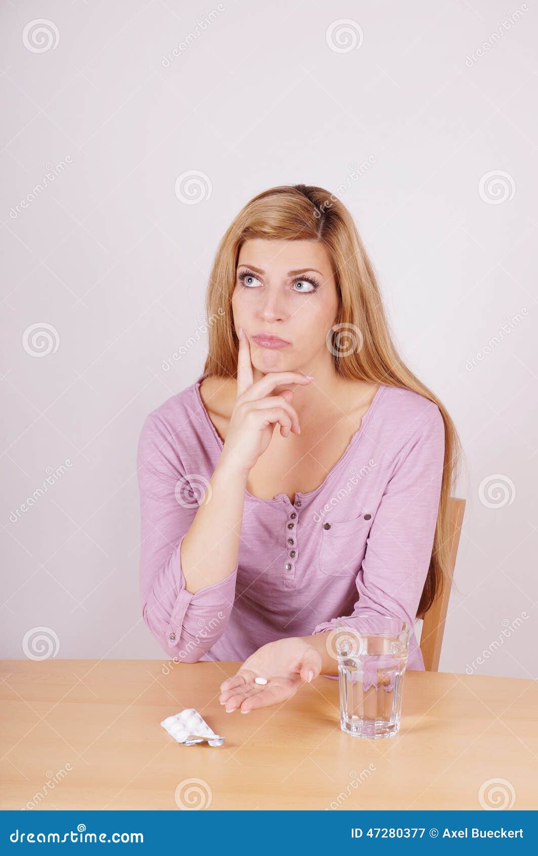 Woman taking tablet stock image. Image of girl, concern - 47280377