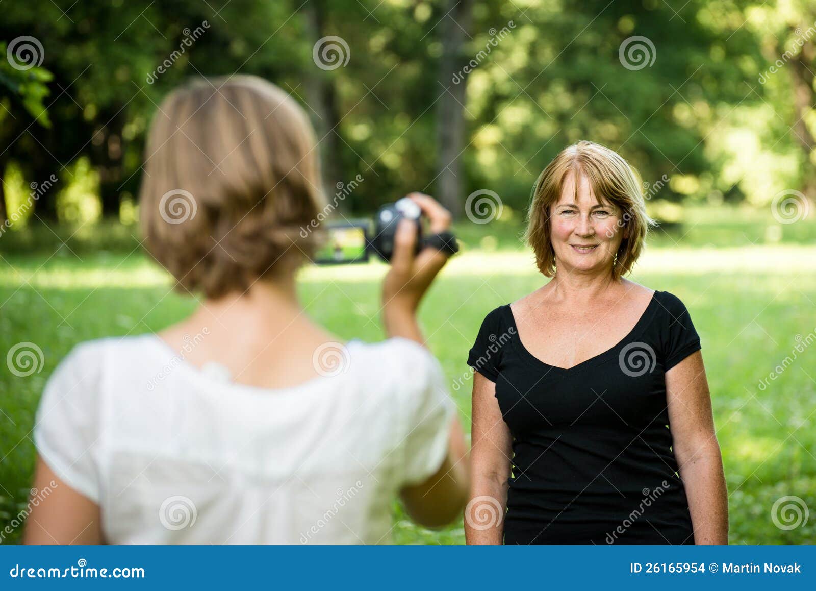 Woman is Taking Video of Her Mother Stock Photo - Image of child, adult ...