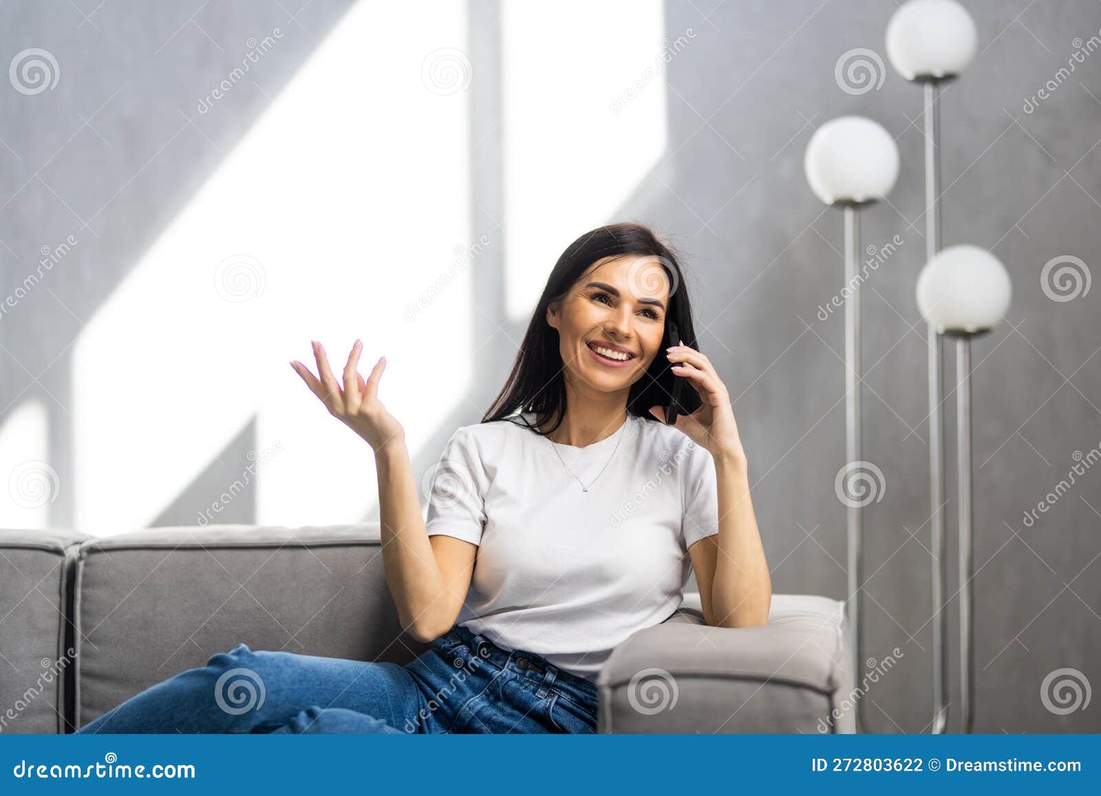 Young Woman Talk Phone while Relaxing on Couch Stock Photo - Image of ...