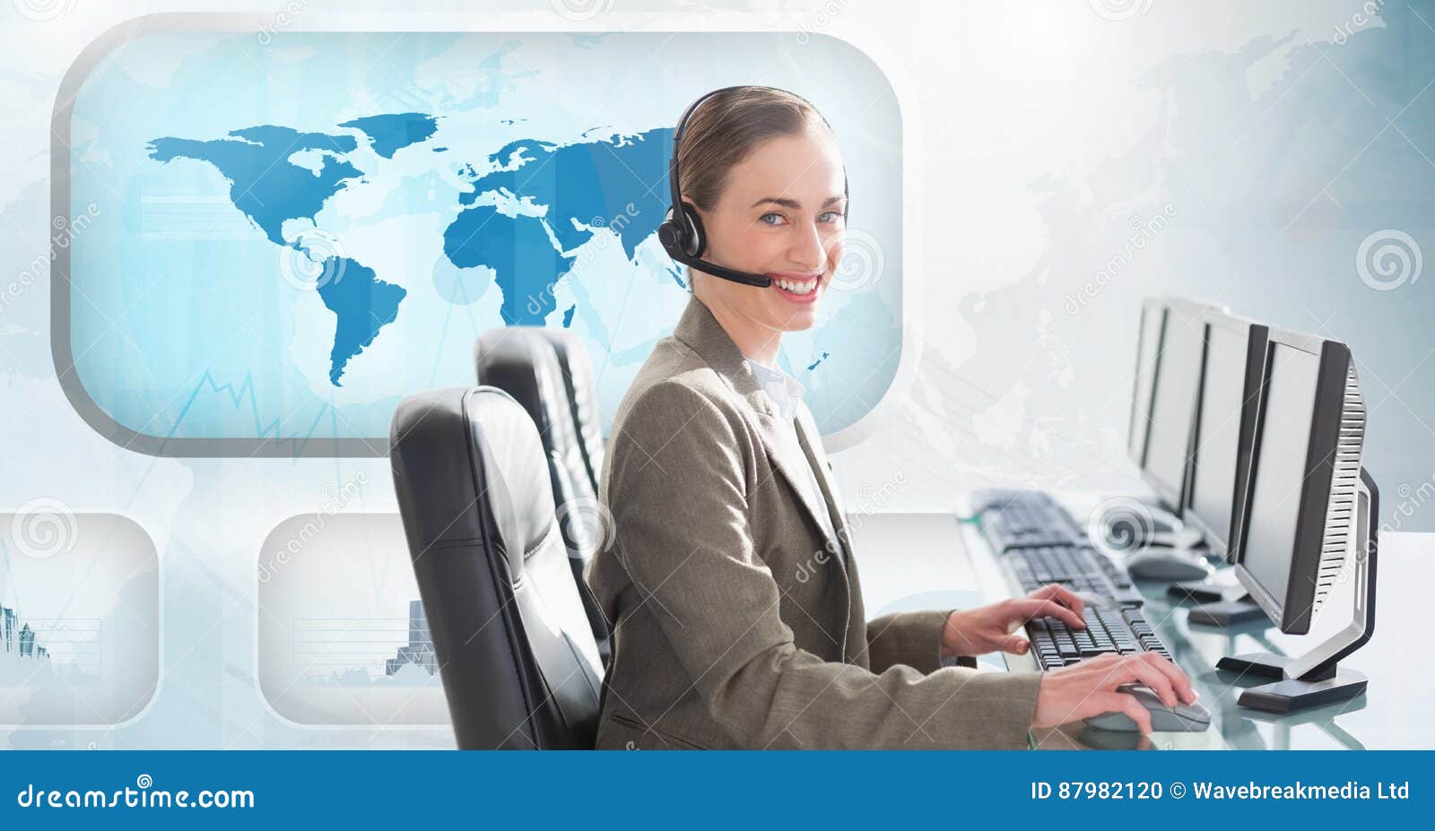 Woman Talking on Headset and Using Computer in Call Centre with World ...