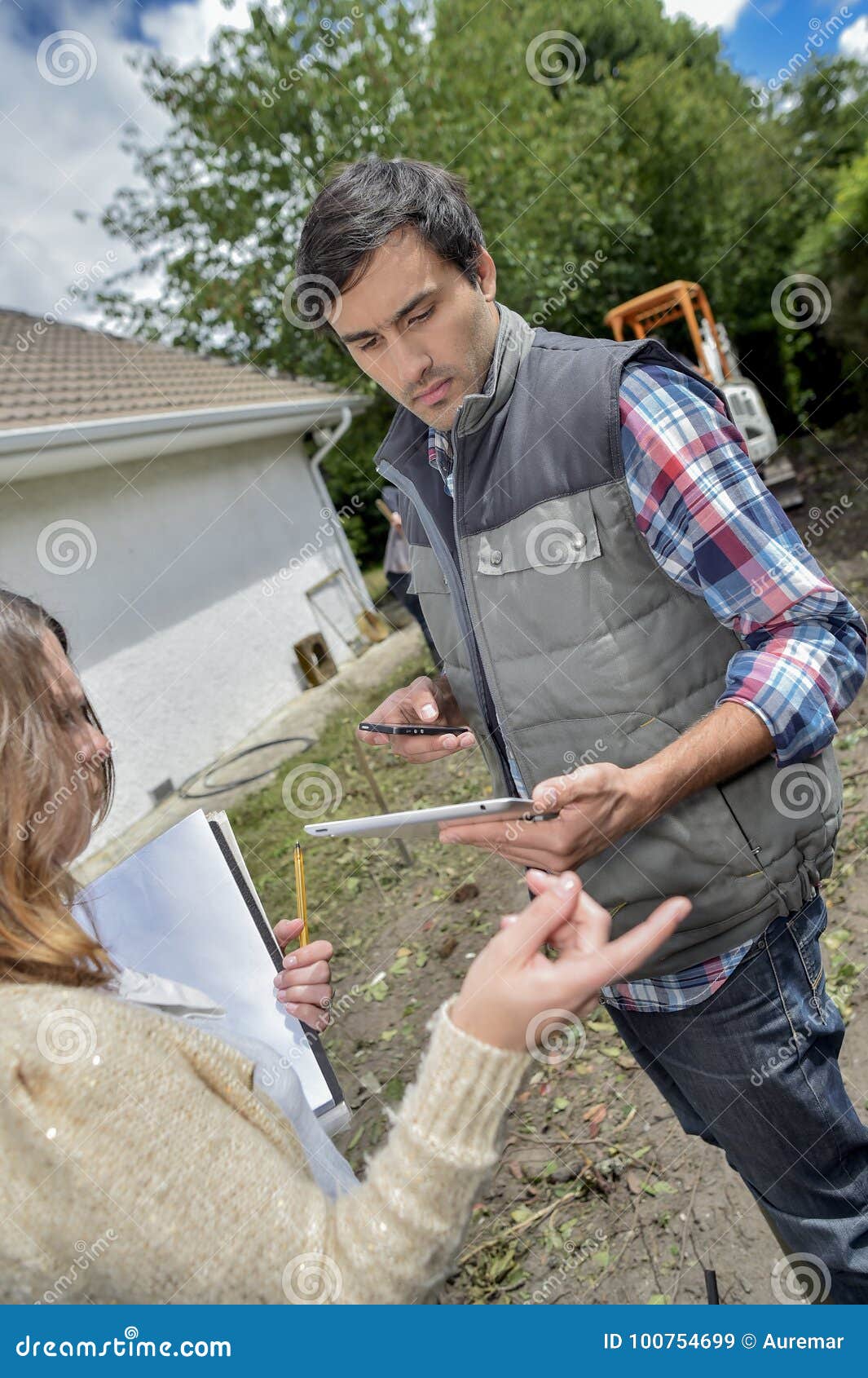 Woman Talking with Landscape Gardener Stock Image - Image of focused ...
