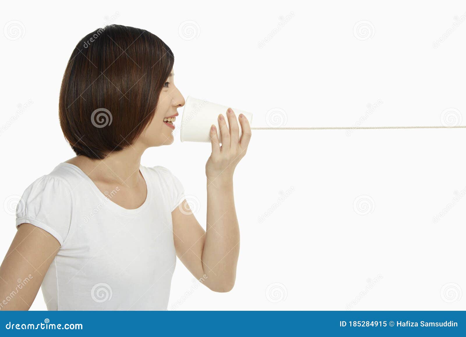 Woman Talking into a Paper Cup Phone Stock Image - Image of person ...