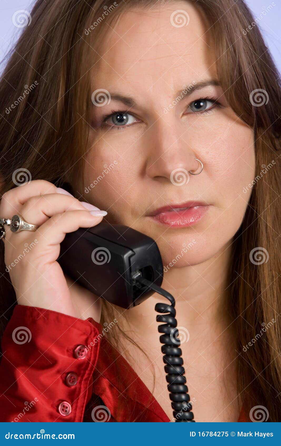 Woman talking on telephone stock image. Image of service - 16784275