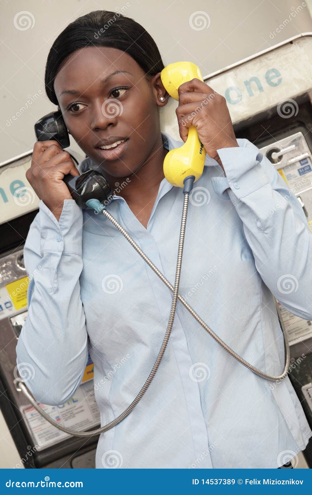 Woman Talking on Two Phones Stock Image - Image of outdoors, fashion ...