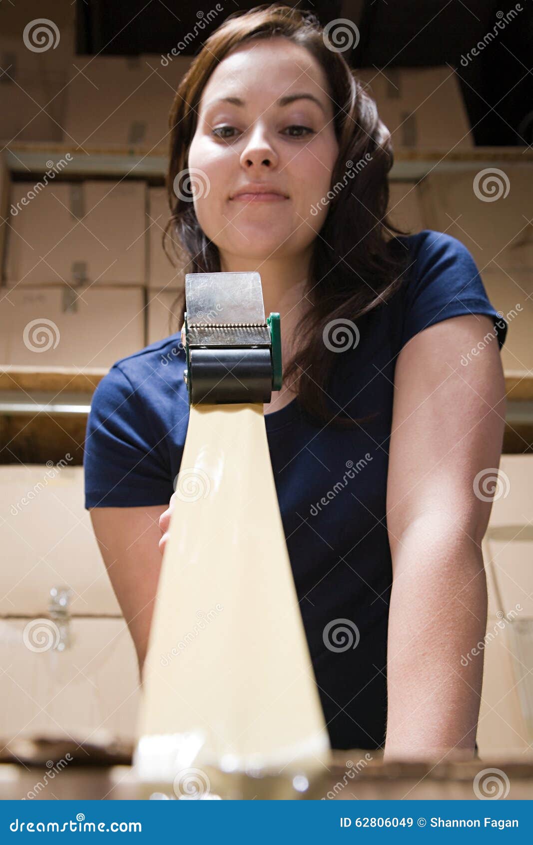 Woman taping up box stock image. Image of indoors, alone - 62806049