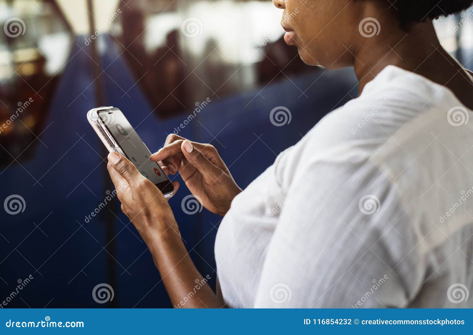 Woman Tapping On Phone Picture. Image: 116854232