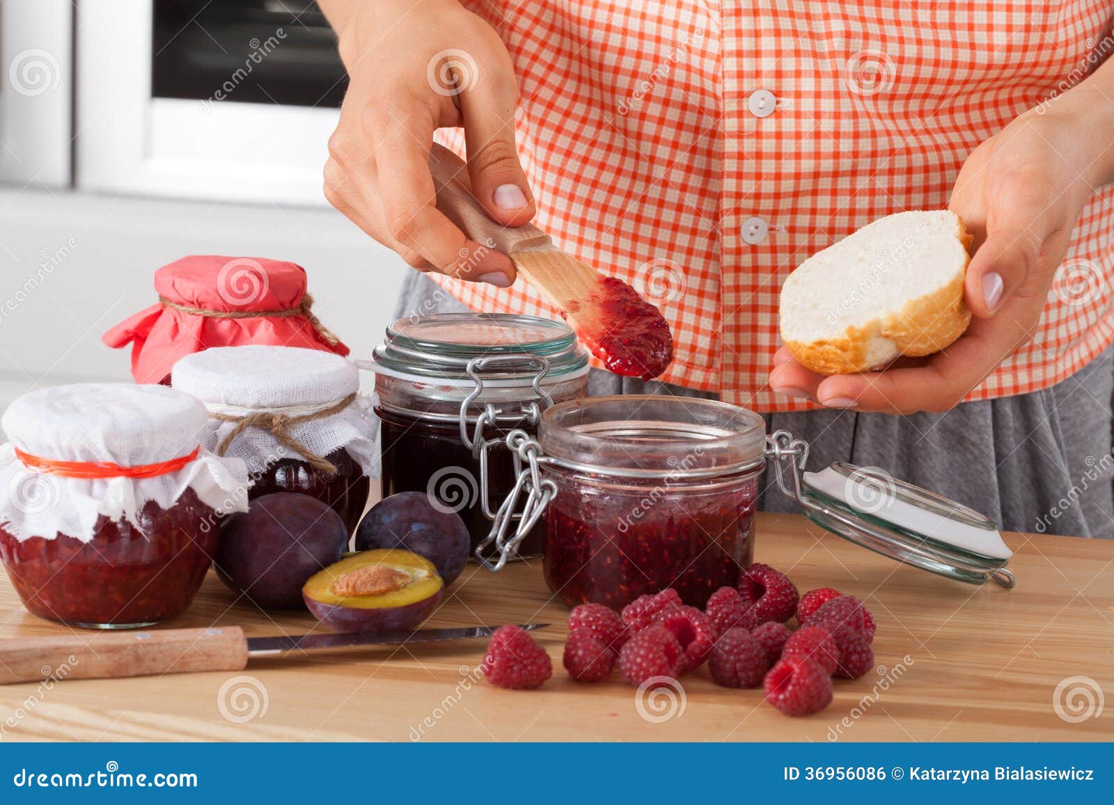 Woman tasting fresh jam stock photo. Image of juicy, plum - 36956086