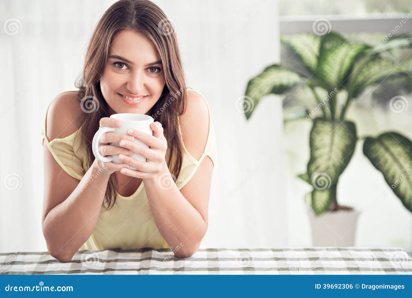 Woman with tea stock photo. Image of home, lovely, brunette - 39692306