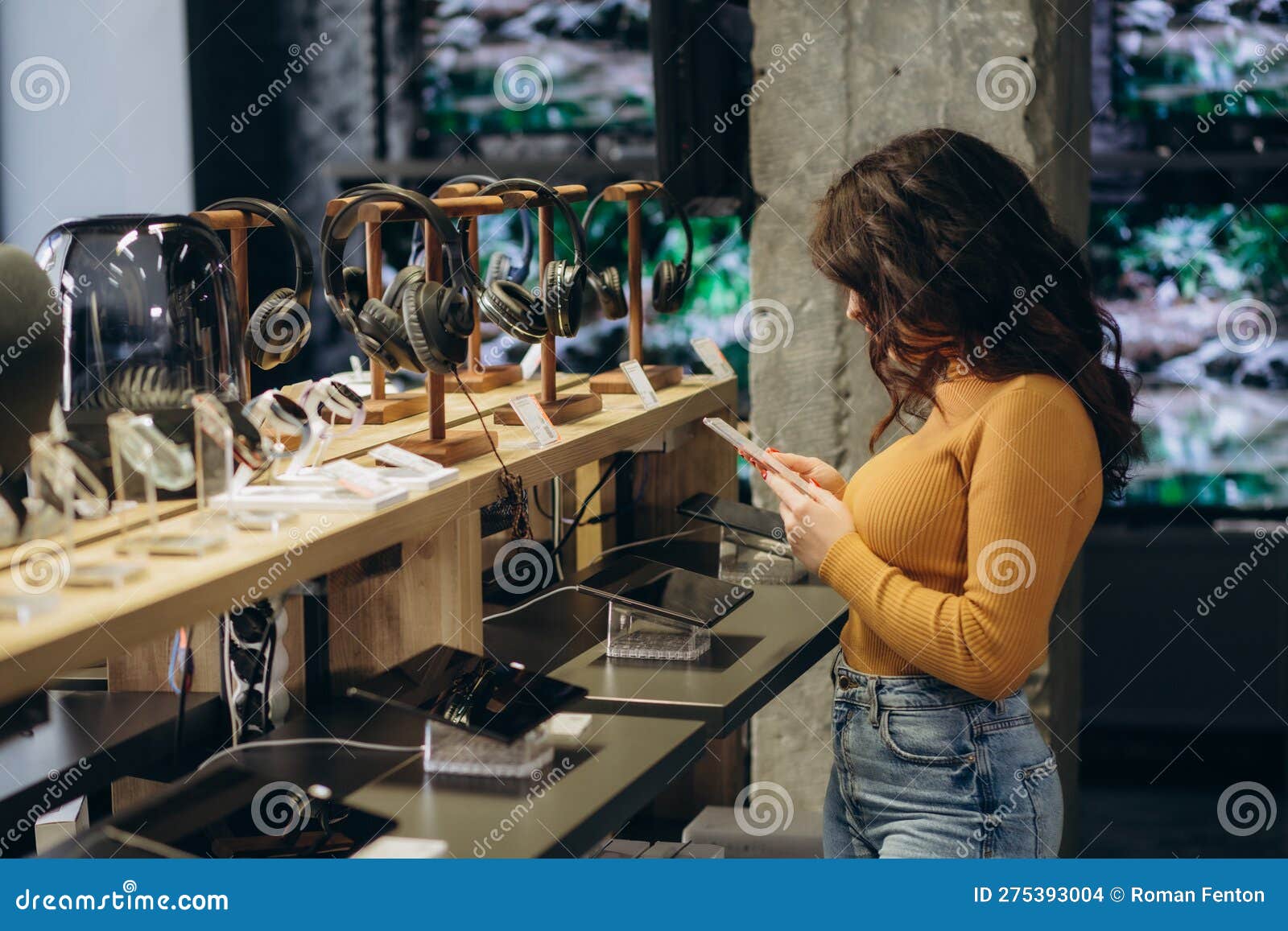 Woman in an Tech Store Chooses a Tablet Stock Photo - Image of storage ...
