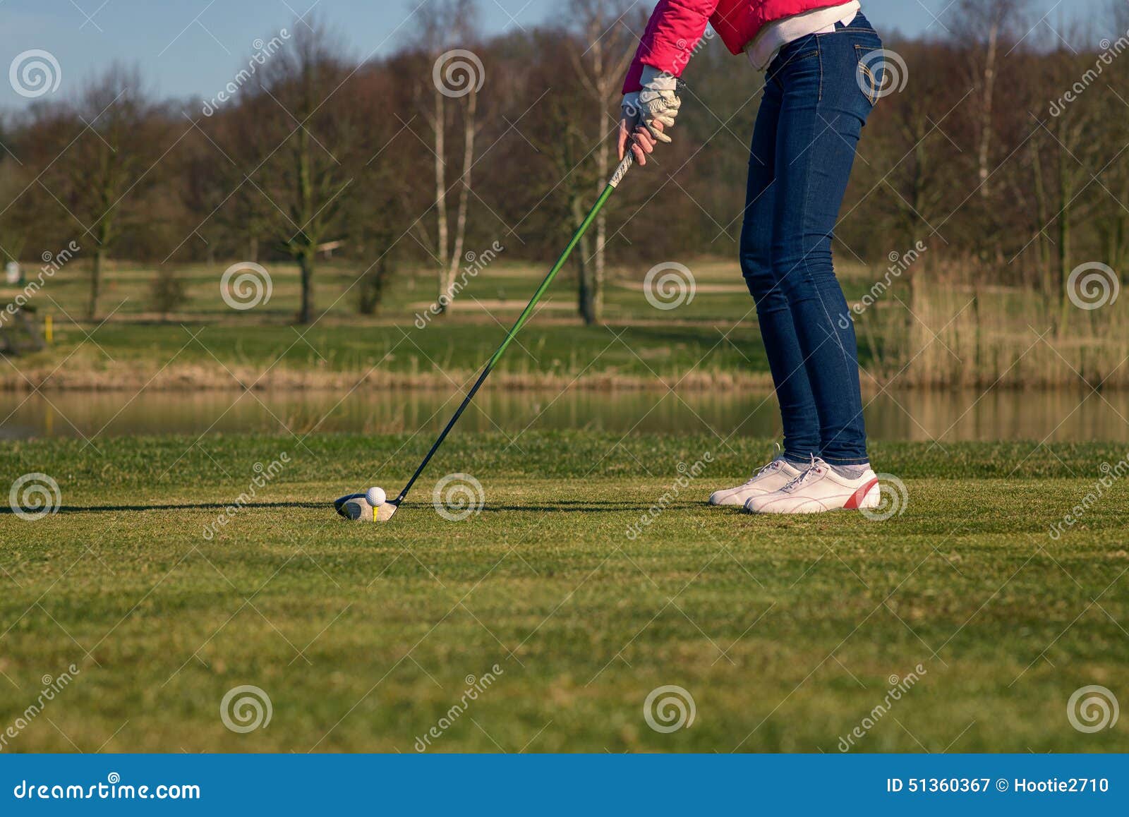 Woman Teeing Off at a Golf Course Stock Image - Image of sunny, autumn ...