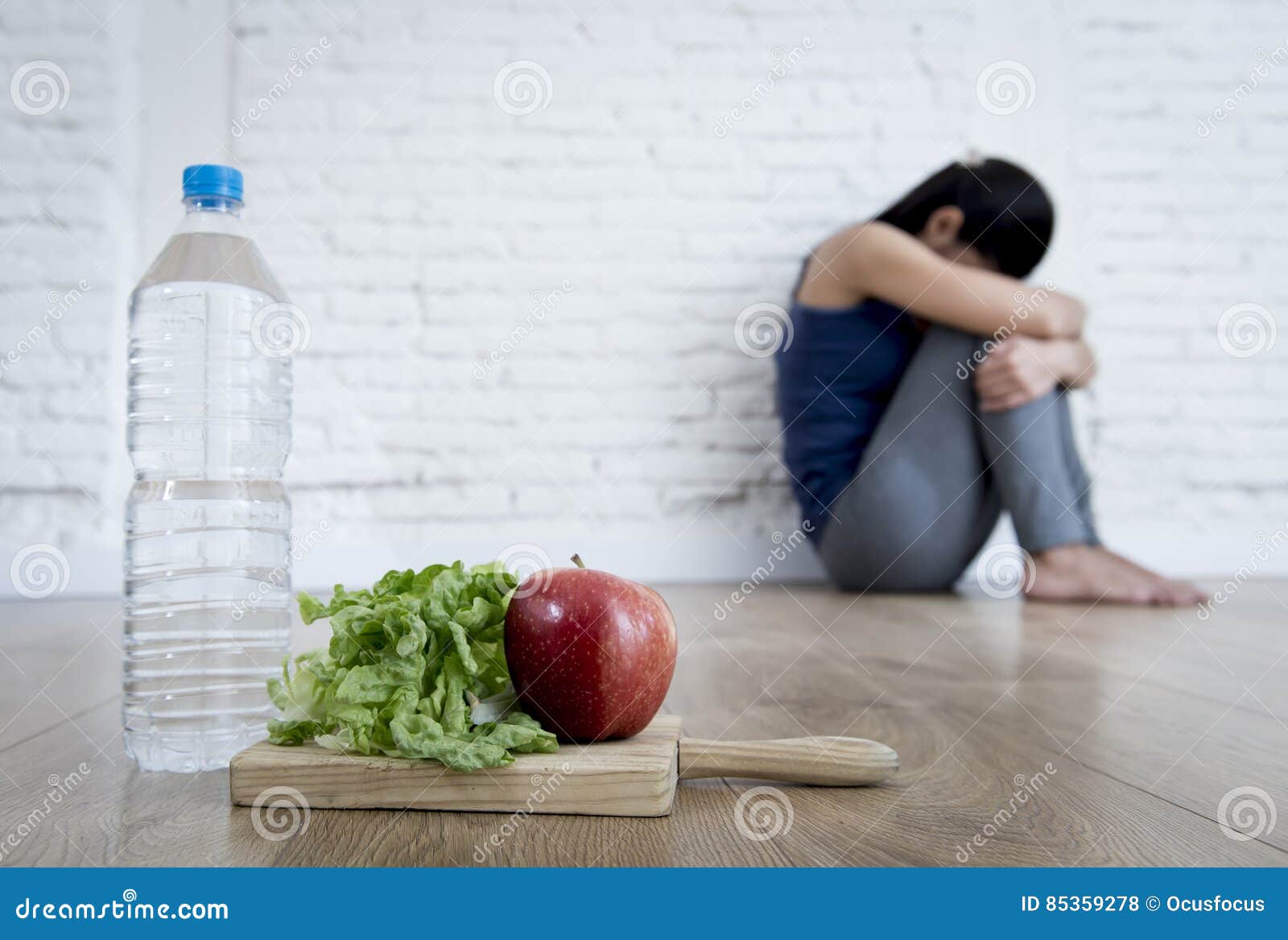 Woman Or Teenager Girl Sitting On Ground Alone Worried At Home