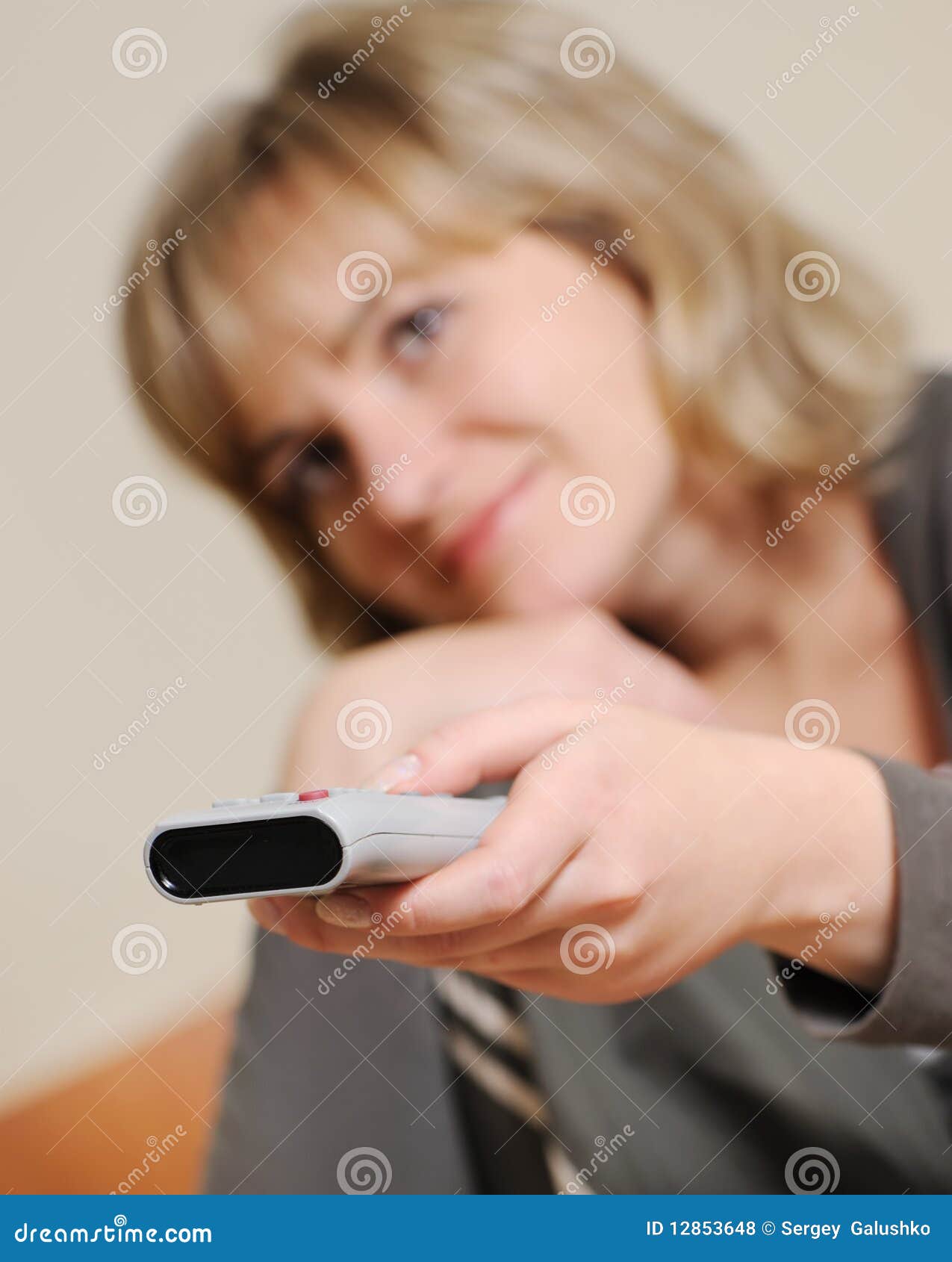 The Woman with a Television Control Panel Stock Photo - Image of home ...