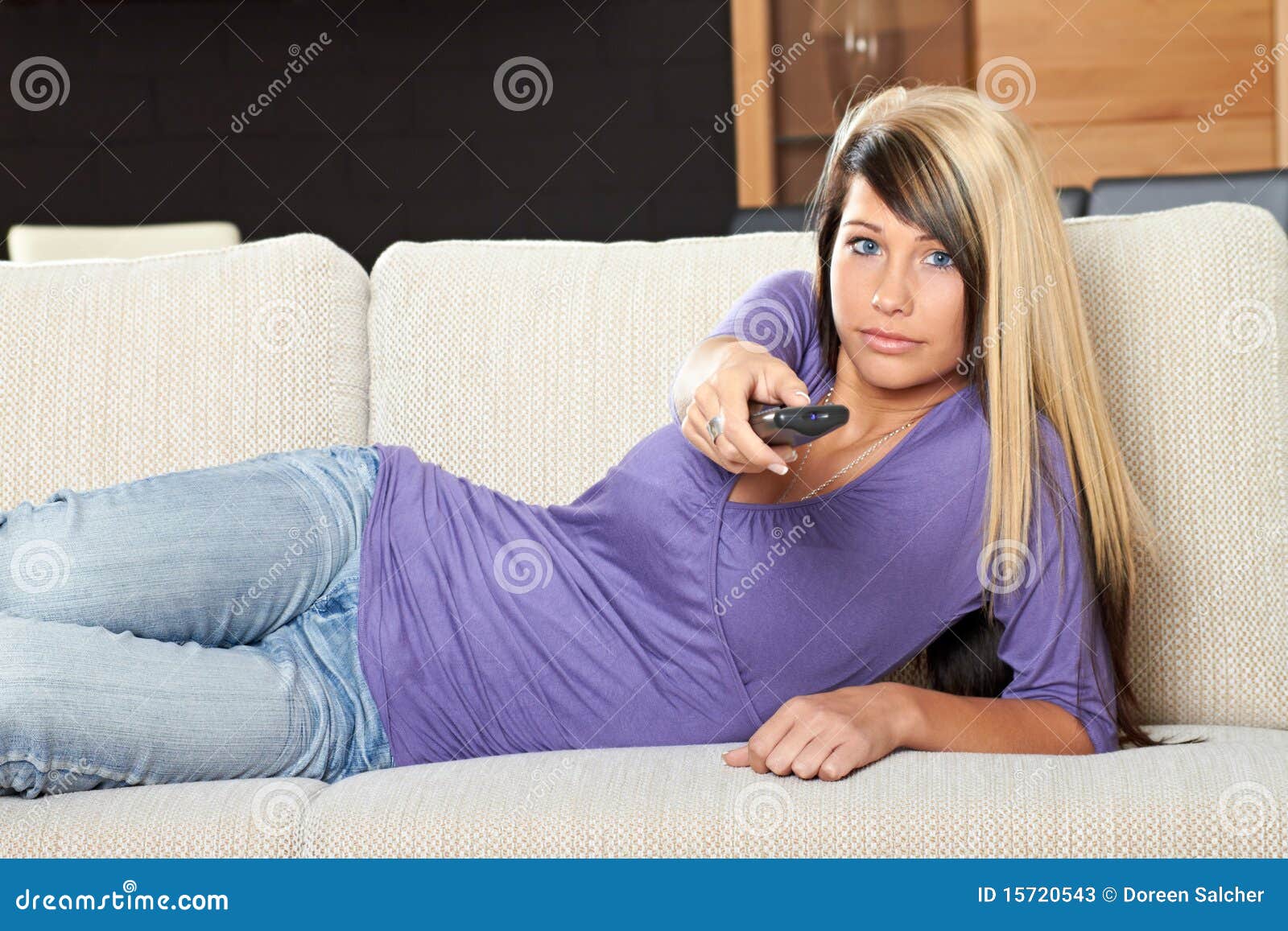 Woman with a Television Remote Stock Image - Image of entertainment ...