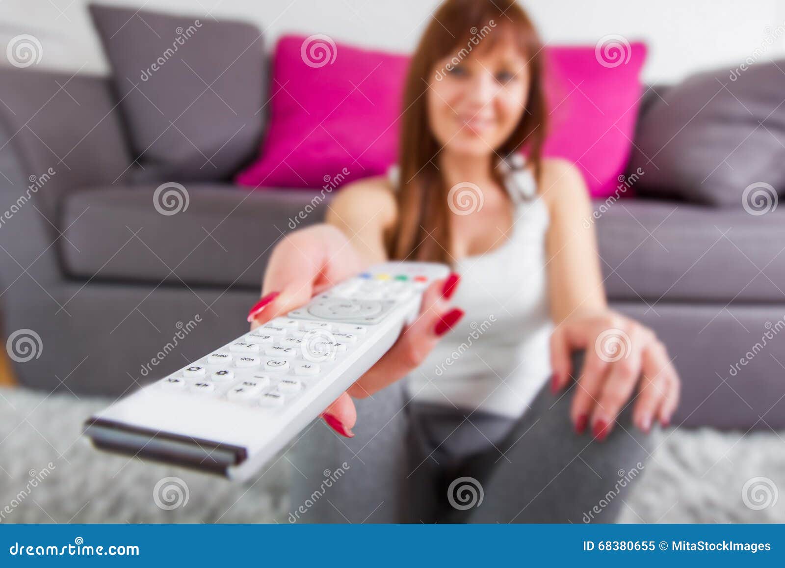 Woman with Television Remote Control Stock Image - Image of room, couch ...