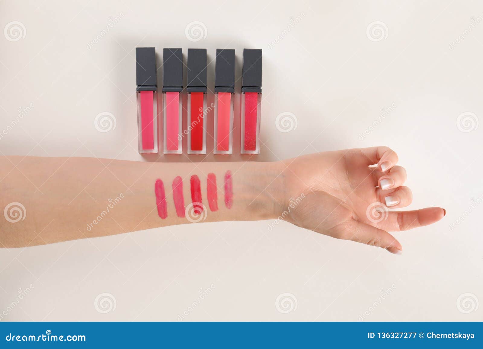 Woman Testing Different Lipsticks on White Background Stock Image ...