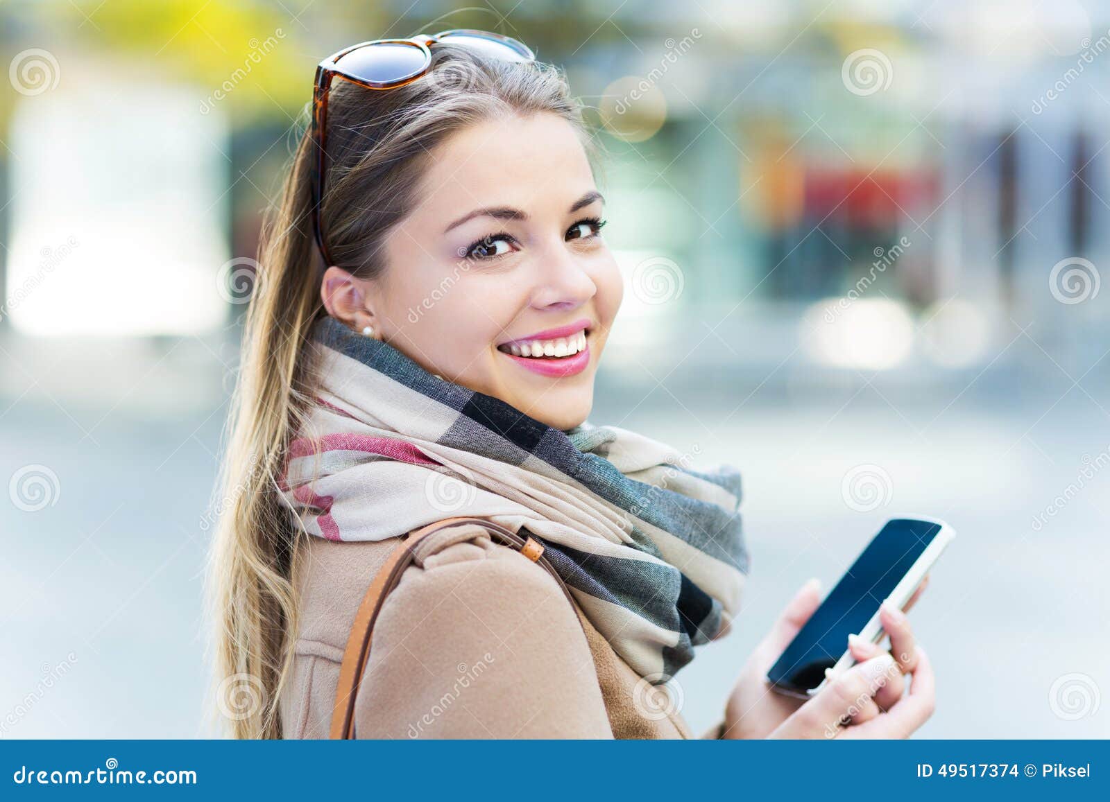 Woman text messaging stock photo. Image of holding, overcoat - 49517374