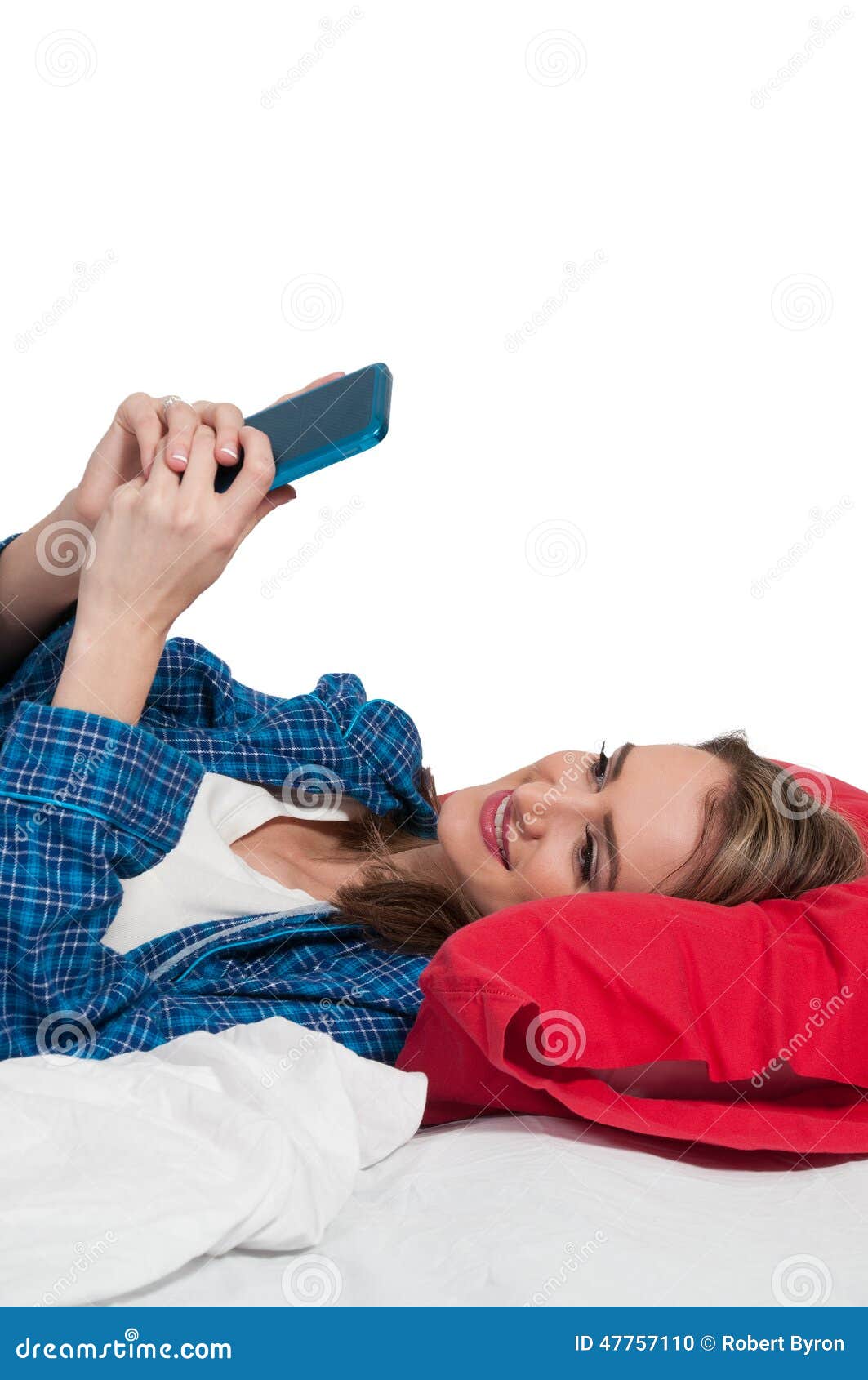 Woman Texting in Bed stock photo. Image of cellular, pillow - 47757110