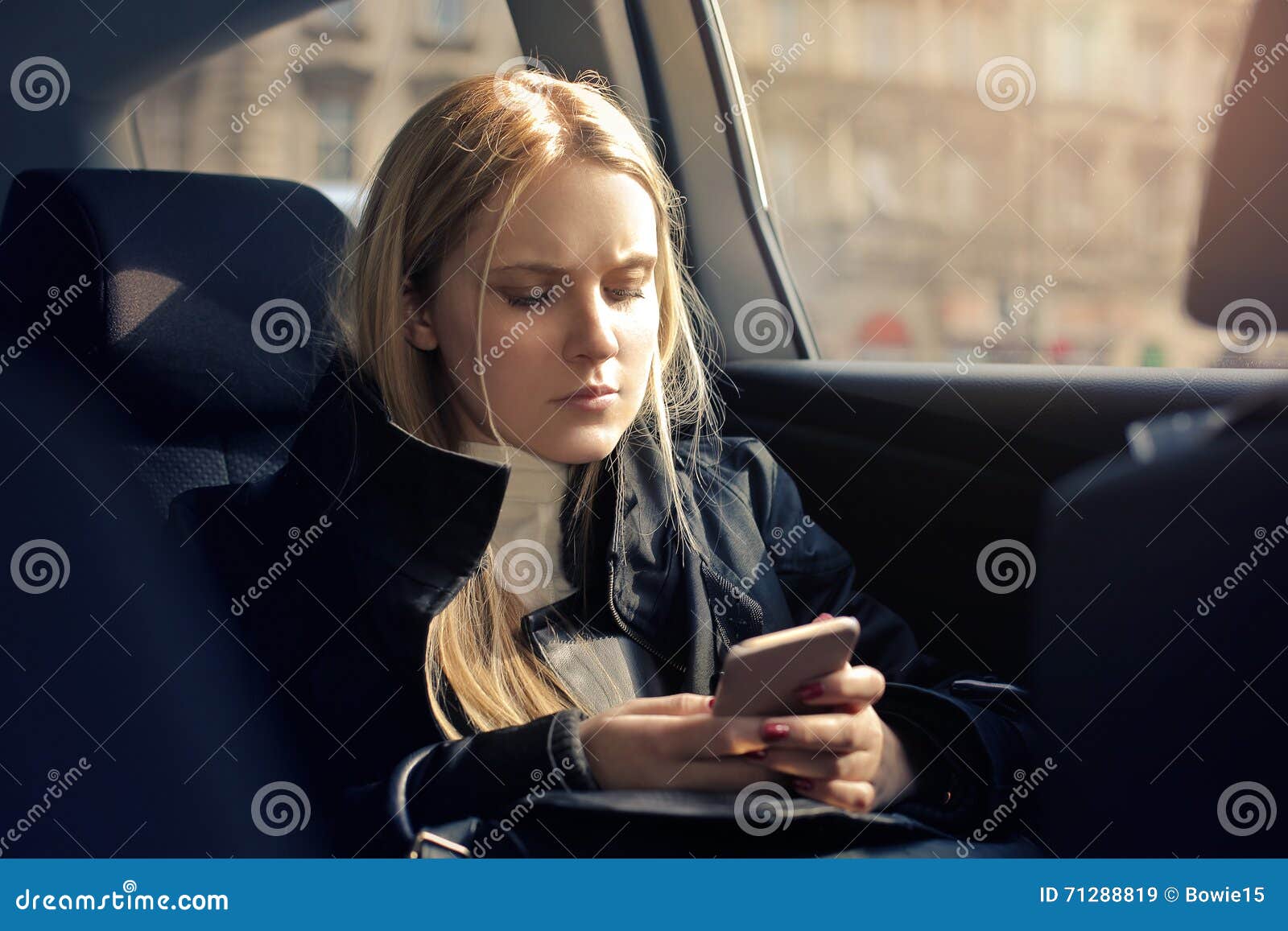 Woman texting stock image. Image of street, blonde, girl - 71288819