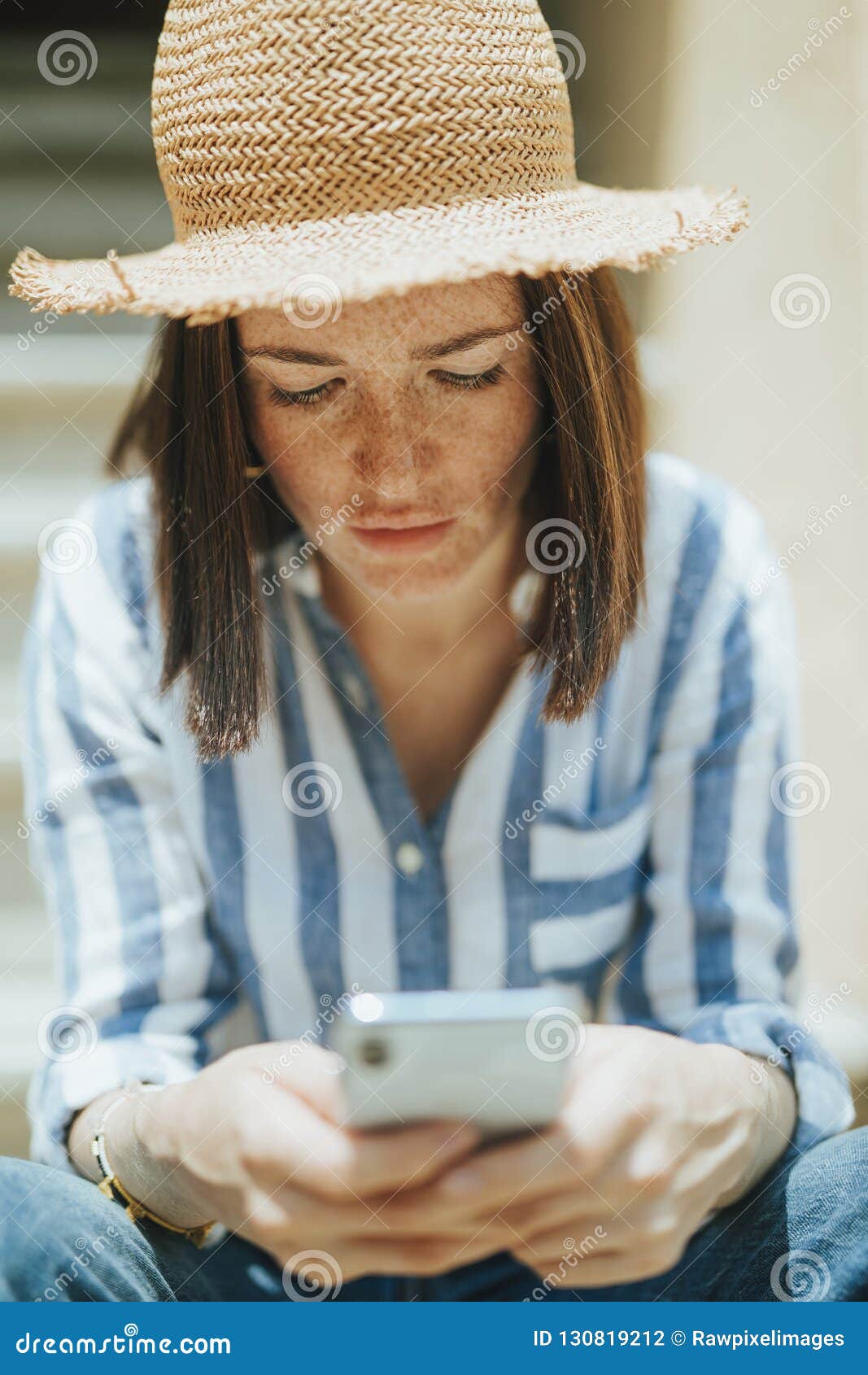 Woman texting on her phone stock photo. Image of american - 130819212 Woman texting on her phone stock photo. Image of american - 130819212