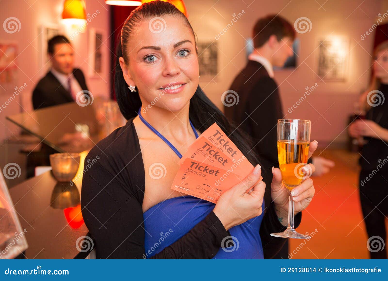 Woman in Theatre Presenting Tickets Stock Photo - Image of glas ...