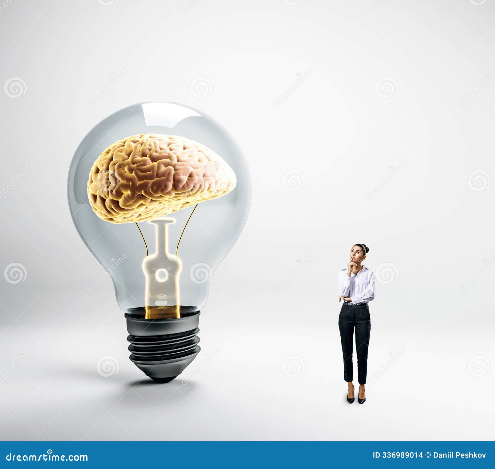 Woman Thinking Next To a Giant Lightbulb with a Brain Inside ...
