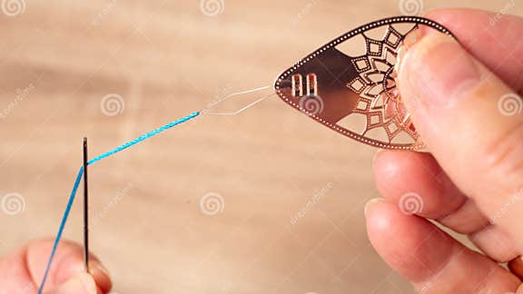 Woman Threading Needle with Threader Stock Image - Image of macro, hand ...