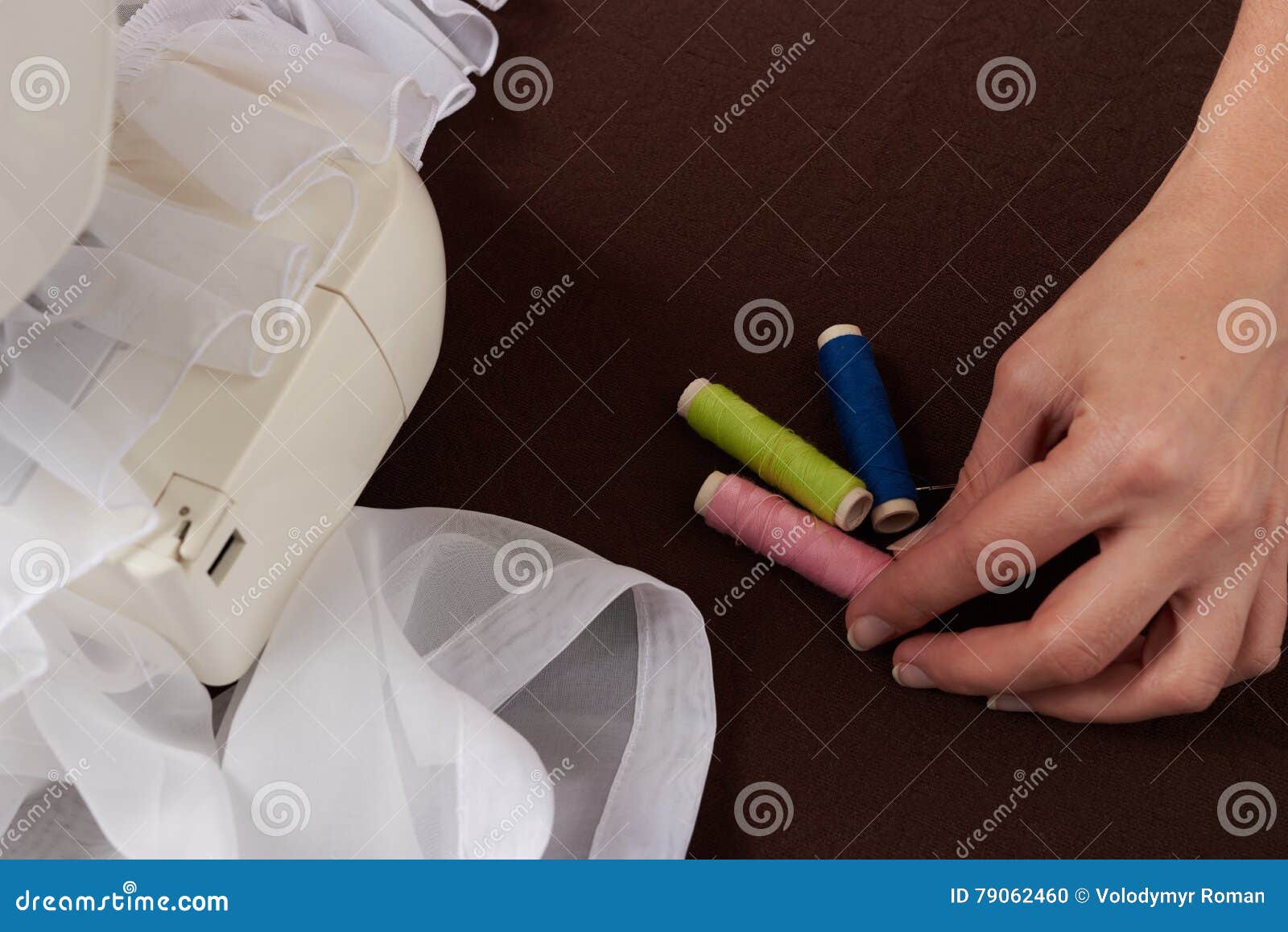 Woman Threading on Sewing Machine Stock Photo - Image of metal, detail ...