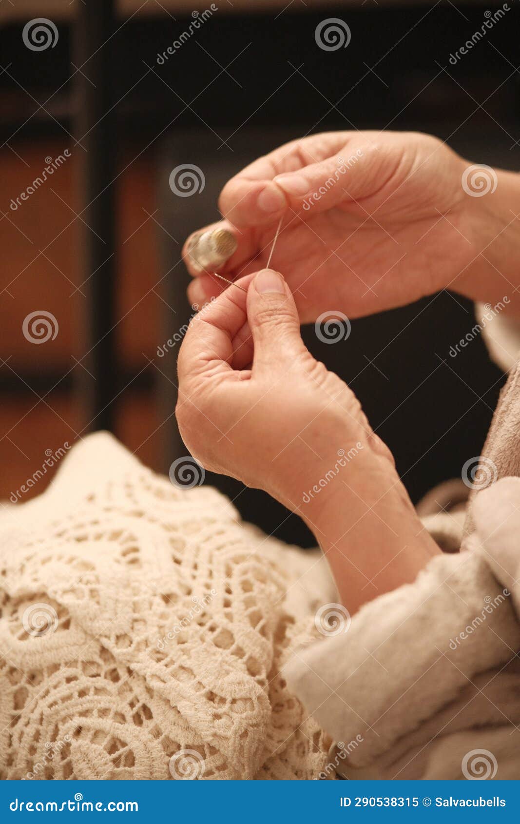 Woman Threading a Sewing Needle Stock Image - Image of hand, finger ...