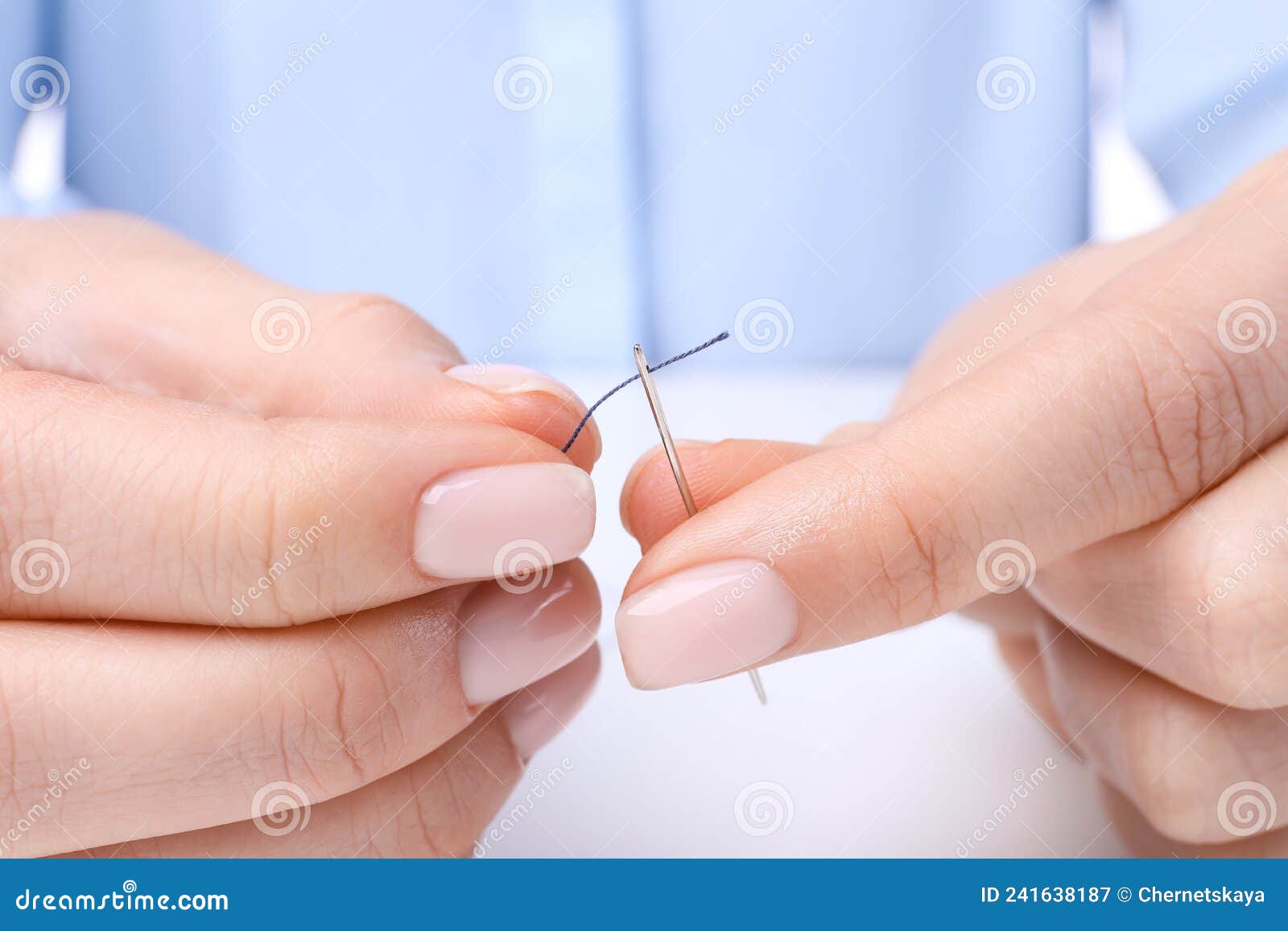 Woman Threading Sewing Needle at Table, Closeup Stock Image - Image of ...