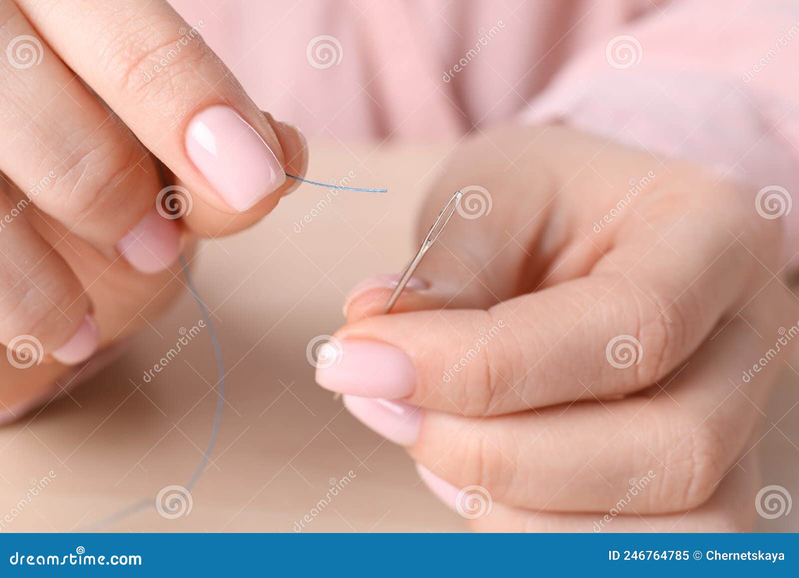 Woman Threading Sewing Needle at Table, Closeup Stock Image - Image of ...
