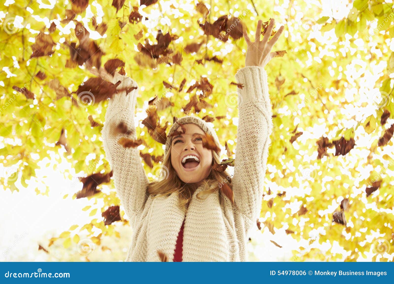 Woman Throwing Autumn Leaves into the Air Stock Photo - Image of ...