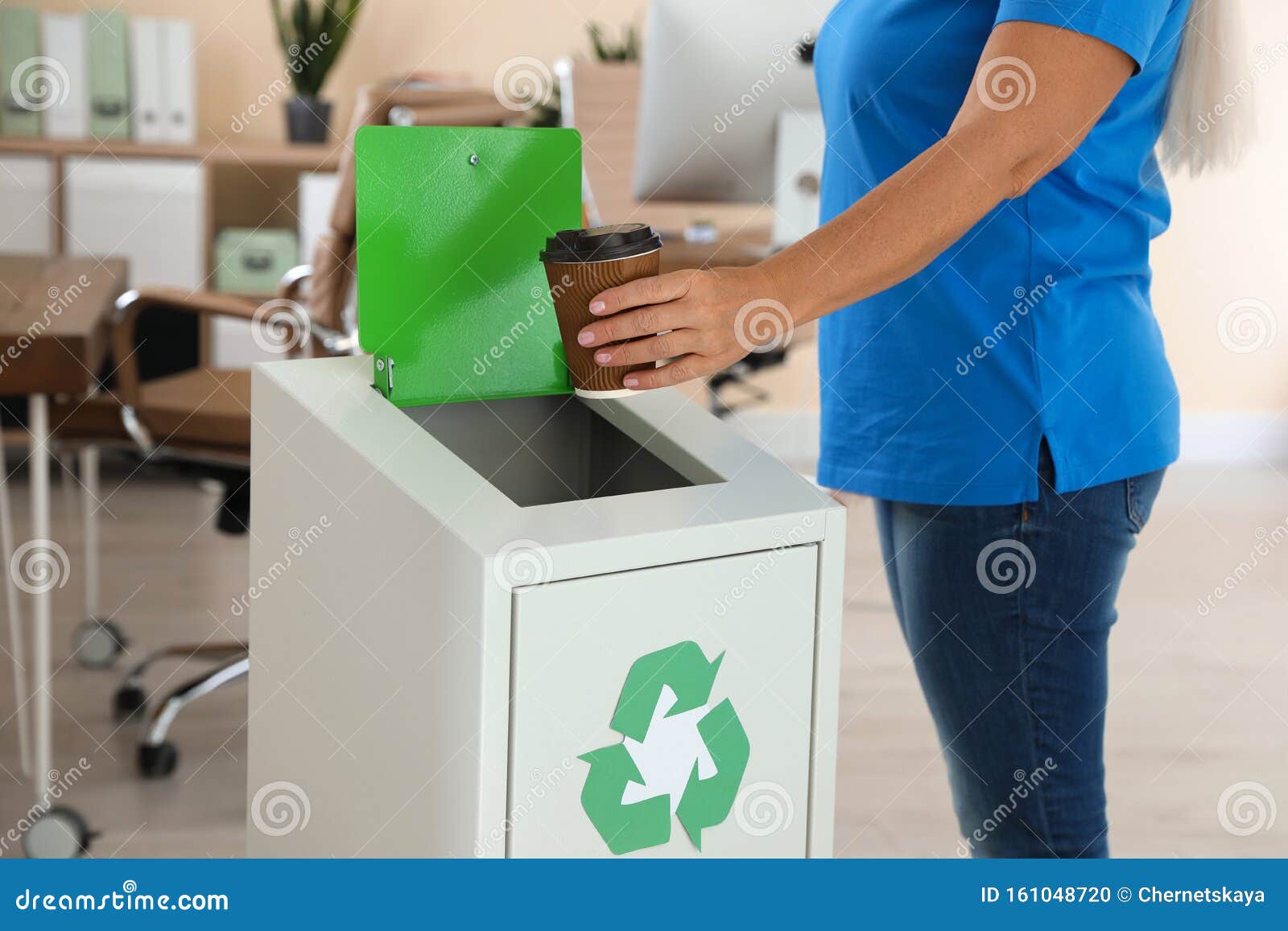 Woman Throwing Coffee Cup into Recycling Bin at Office Stock Photo ...
