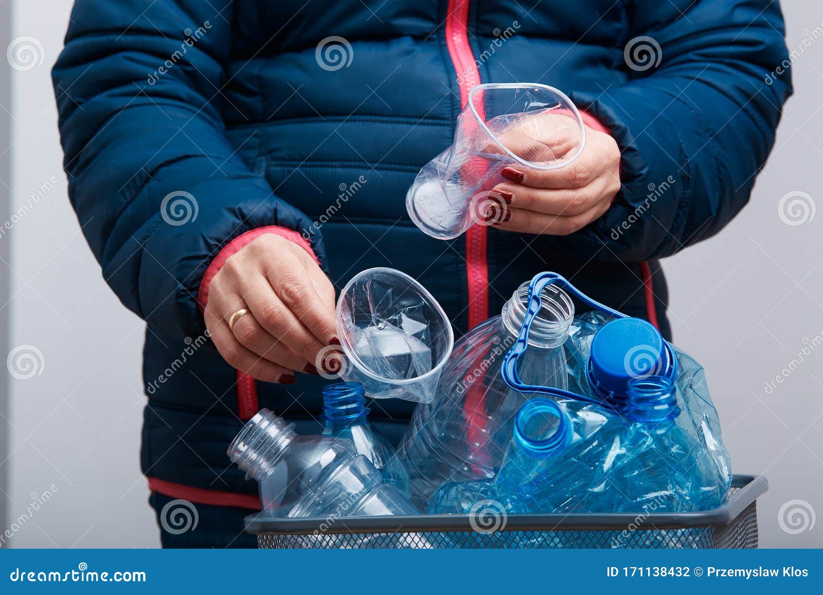 Woman Collecting Used Plastic Bottles and Packagings in Trash Bin Stock ...