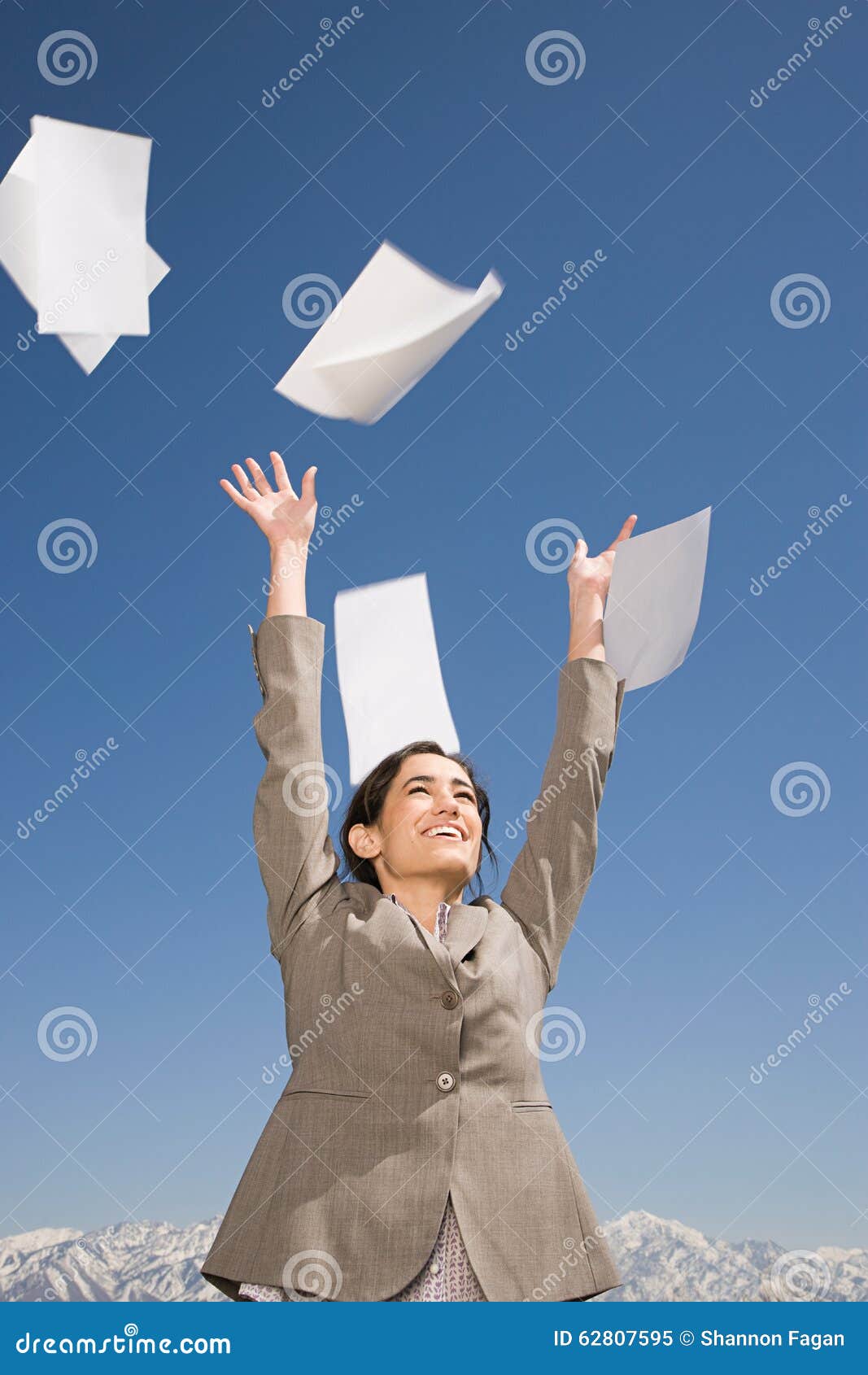 Woman throwing paper stock image. Image of mountain, business - 62807595