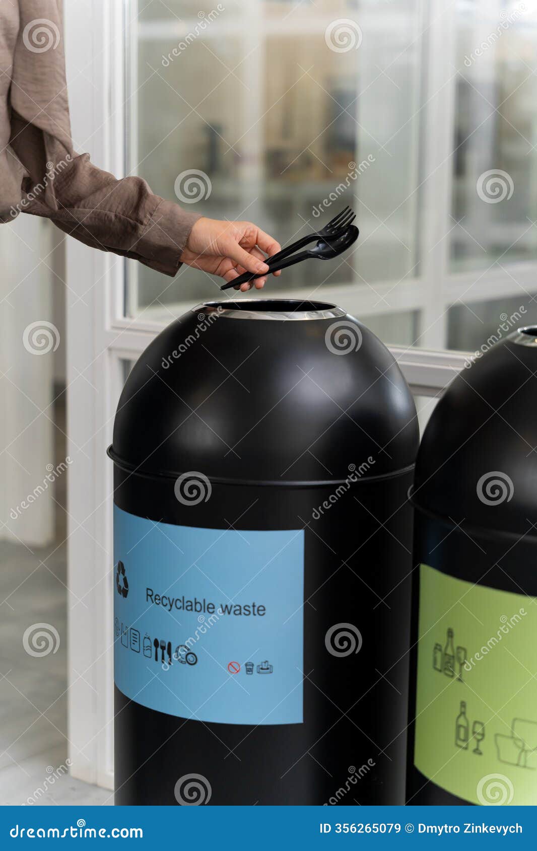 Woman Throwing Plastic Fork and Spoon To the Proper Container for ...