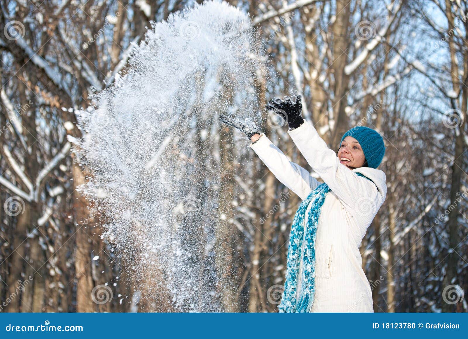 Woman throwing some snow stock photo. Image of satisfaction - 18123780
