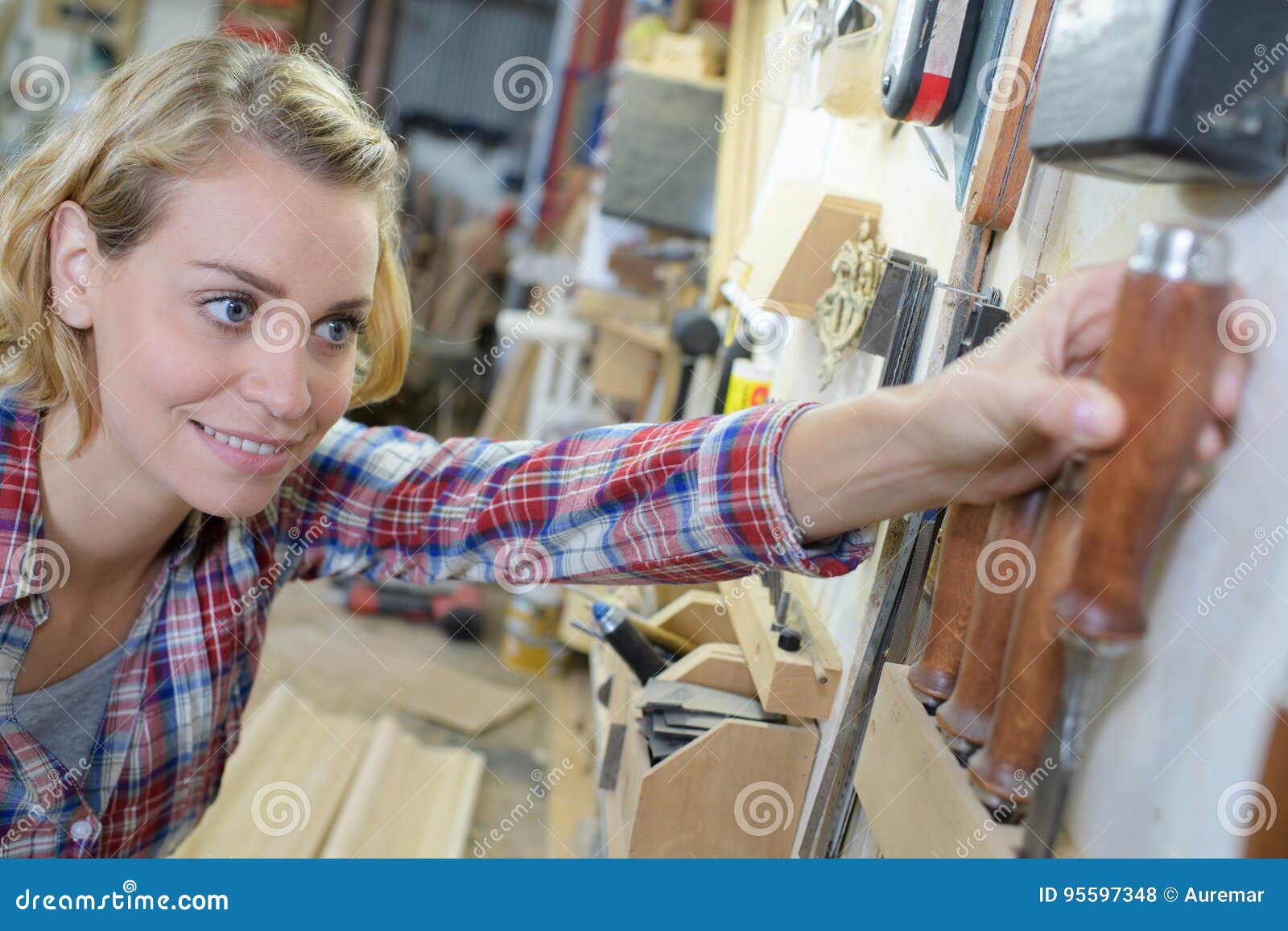 Woman Tidying Up Chisel at Workshop Stock Photo - Image of home ...