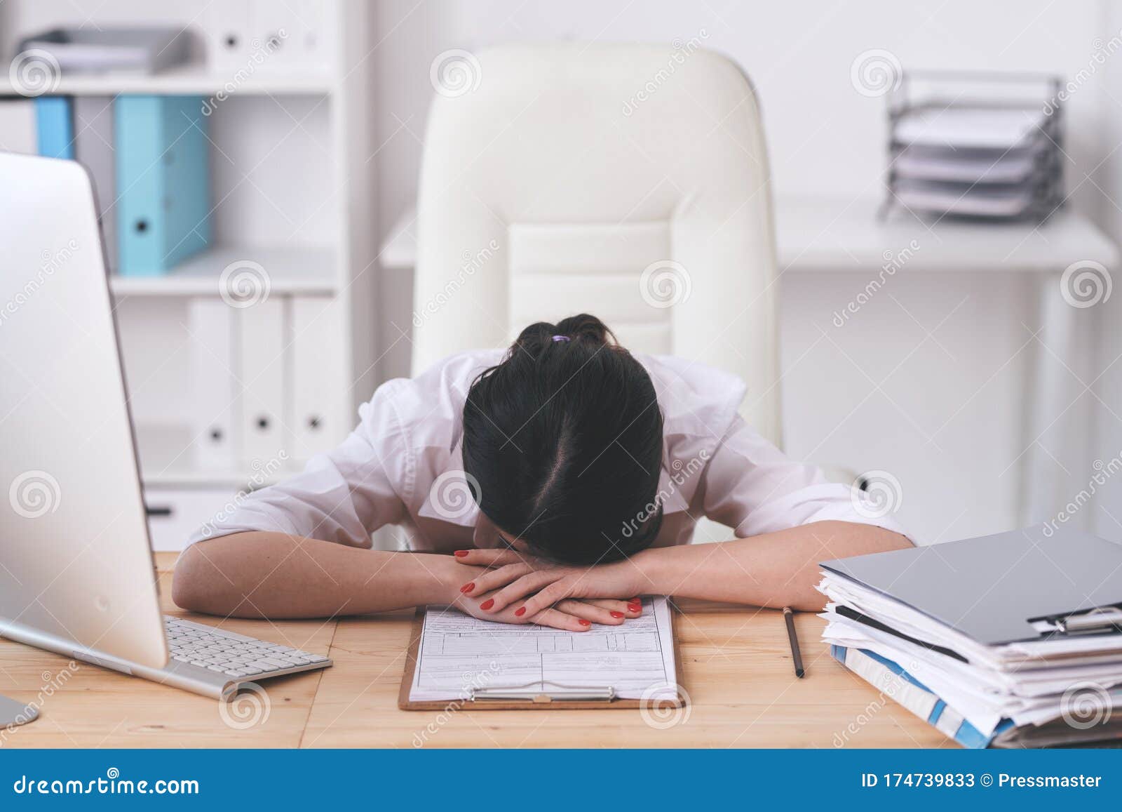 Exhausted Woman At Work